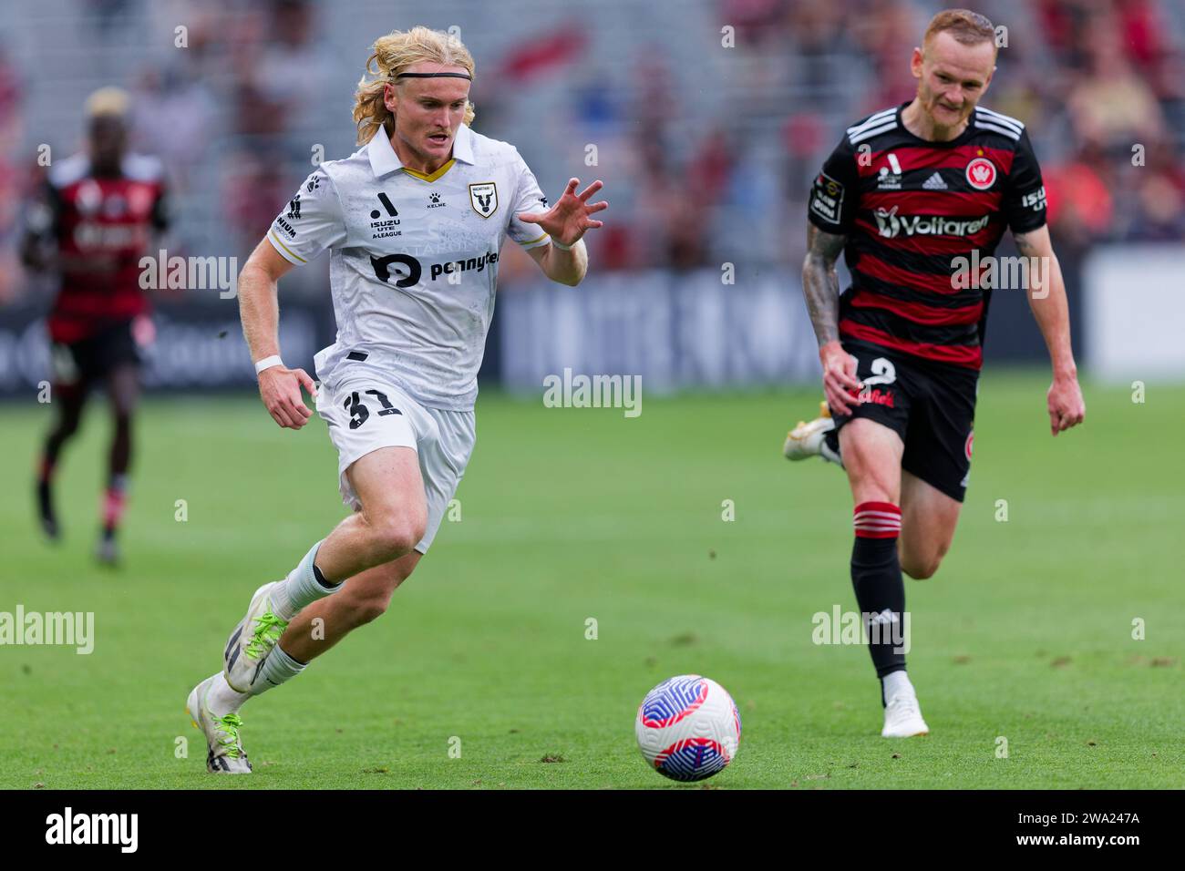 Sydney, Australia. 01st Jan, 2024. Lachlan Rose of Macarthur chases ...