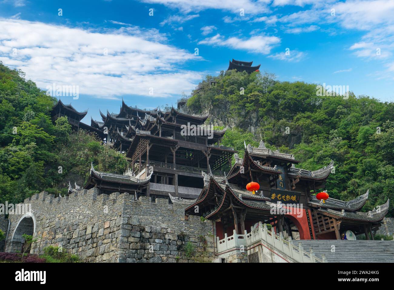 The brown and black stilted buildings are built according to the ...