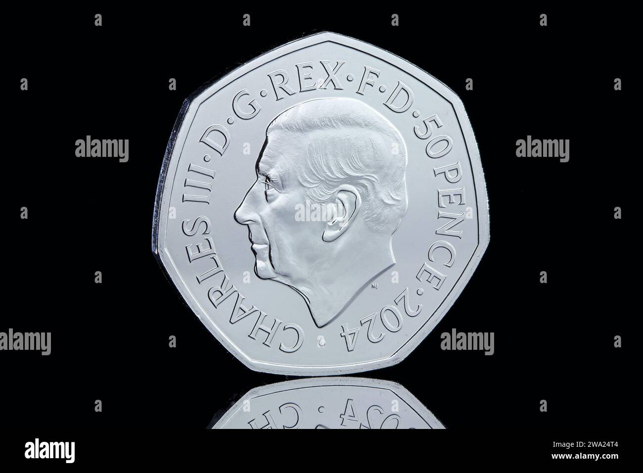 The first 50 pence coin of 2024 features a Tyrannosaurus Rex on the ...