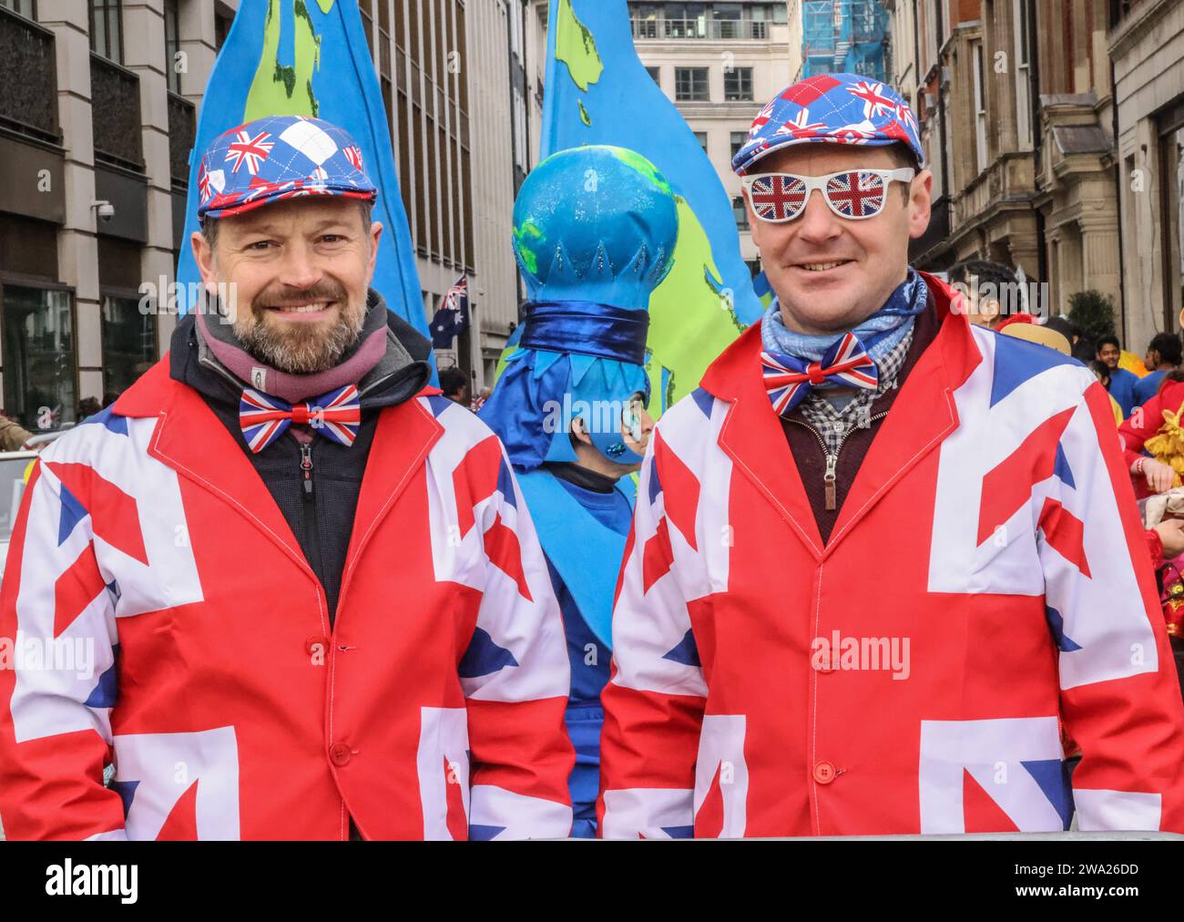 London, UK. 01st Jan, 2024. Crowds line up the streets of Central London today to enjoy The 37th ...