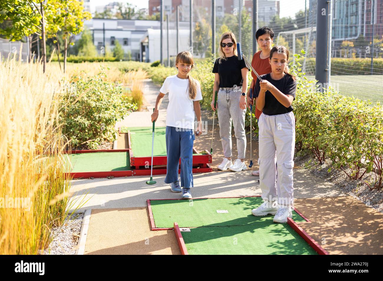 Kids playing golf inside playground artificial grass activity game for ...