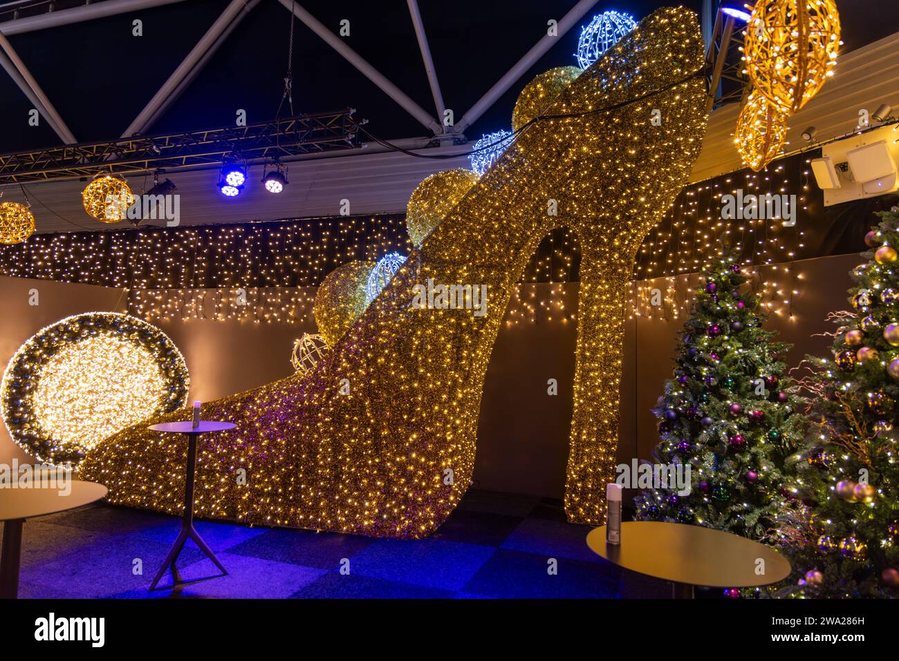 Huge shoe with high heels made from little lamps (LED) as shown on the ...