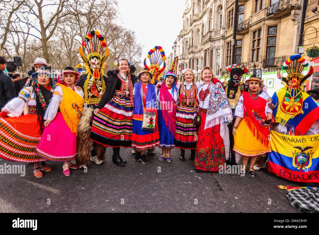 London, UK. 01st Jan, 2024. Crowds line up the streets of Central London today to enjoy The 37th ...