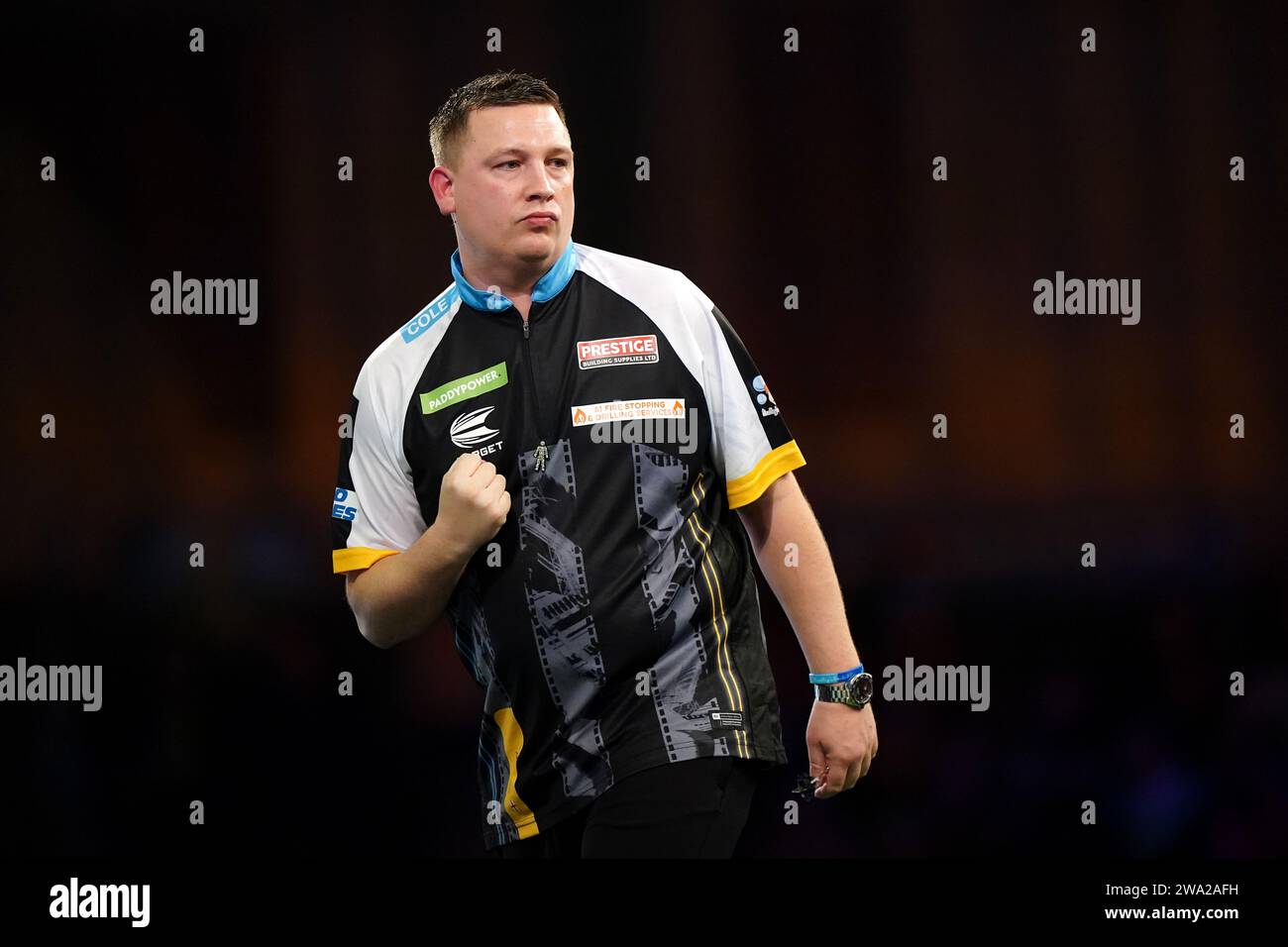 Chris Dobey in action against Rob Cross (not pictured) on day fourteen ...