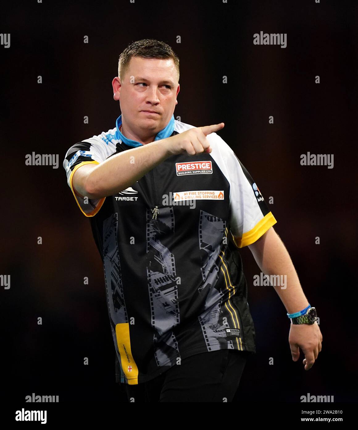Chris Dobey in action against Rob Cross (not pictured) on day fourteen ...