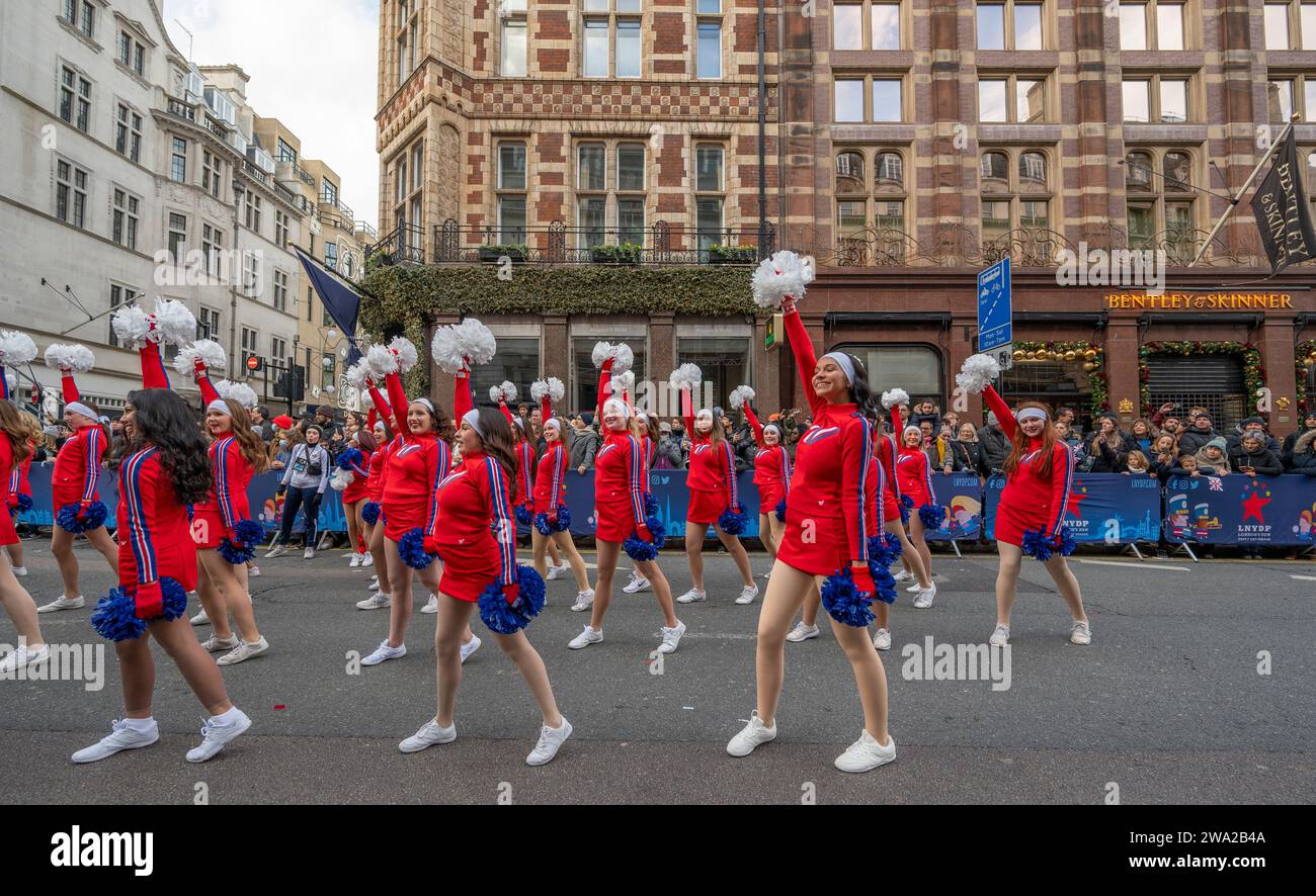London, UK. 1st Jan, 2024. The colourful LNYDP2024 takes place in central London from Piccadilly ...