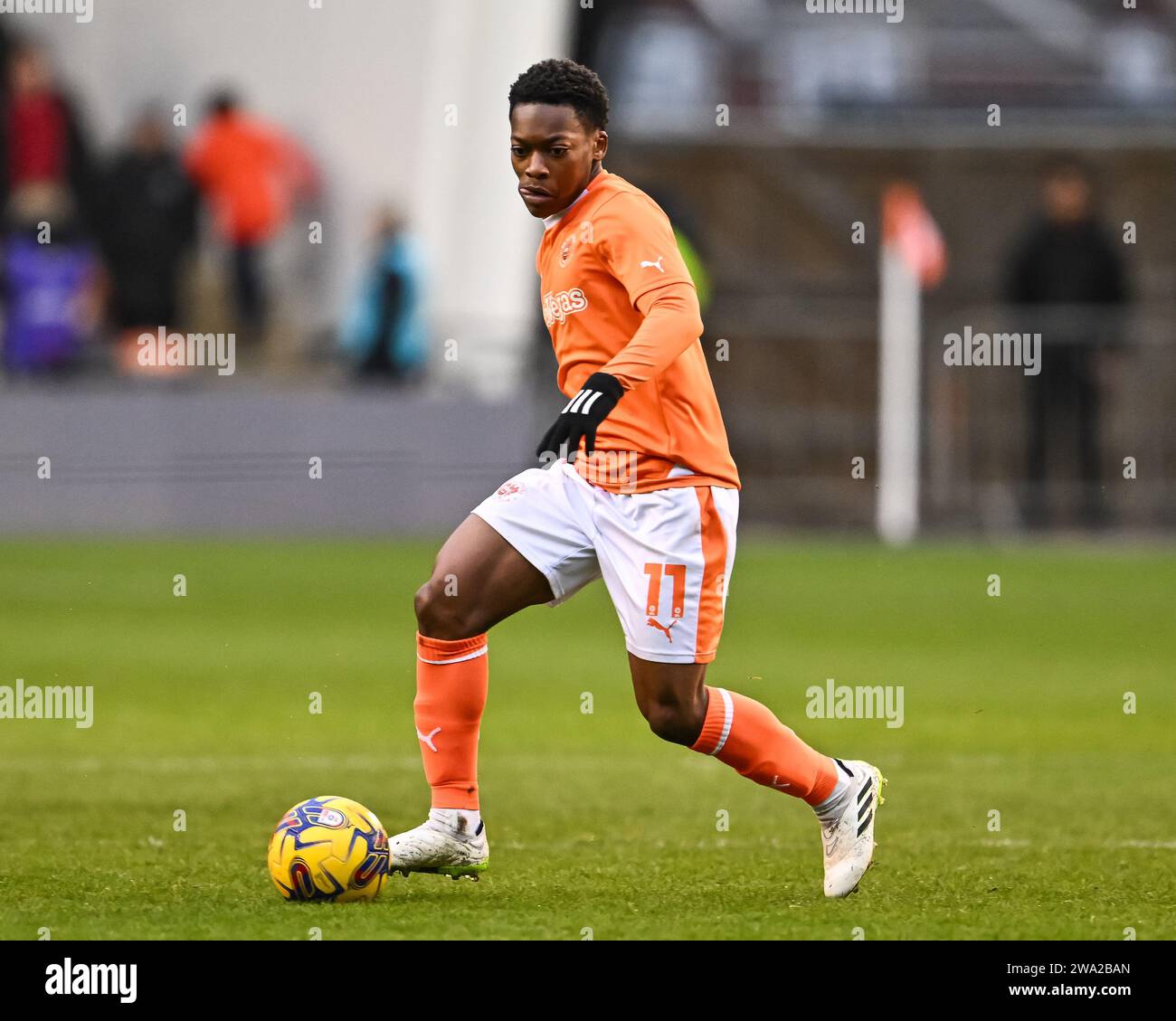 Karamoko Dembélé of Blackpool makes a break with the ball during the ...