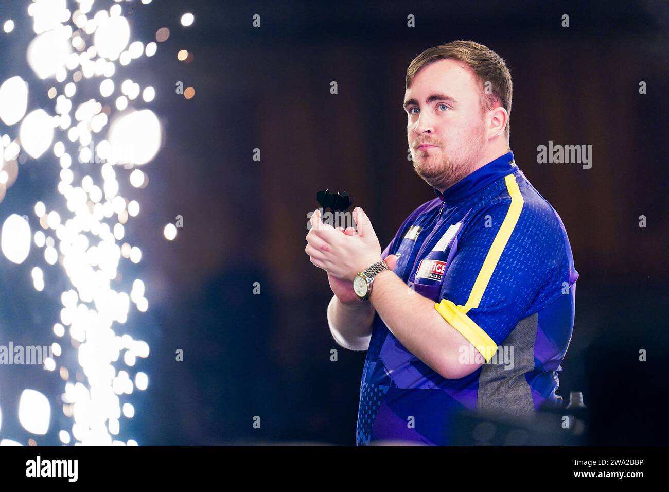 Luke Littler in action against Brendan Dolan (not pictured) on day ...