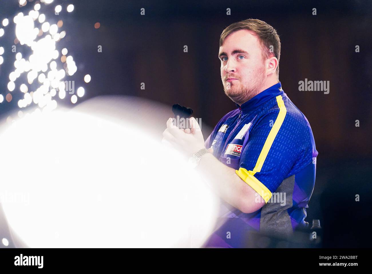 Luke Littler in action against Brendan Dolan (not pictured) on day ...