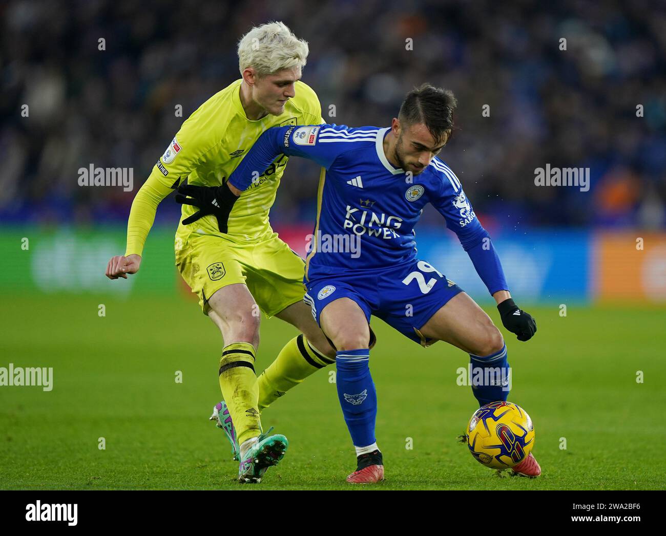 Leicester City's Yunus Akgun (right) and Huddersfield Town's Jack ...