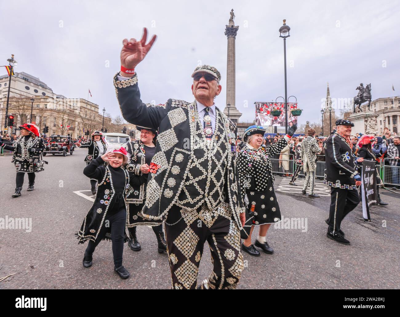 London, UK. 01st Jan, 2024. Crowds line up the streets of Central London today to enjoy The 37th ...