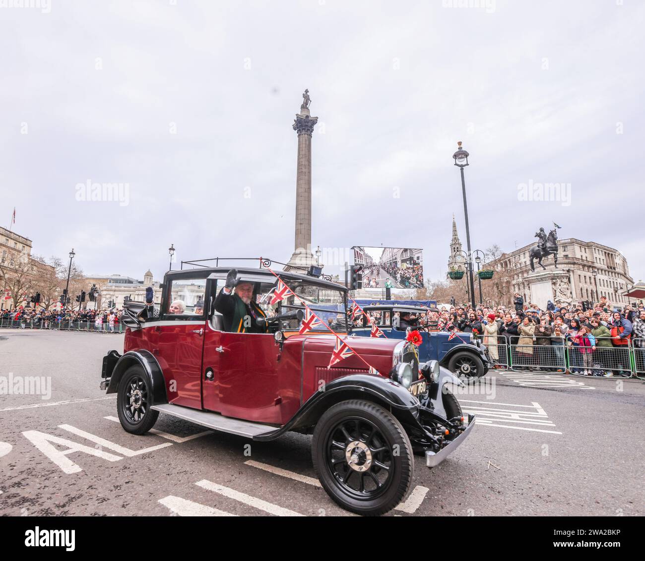 London, UK. 01st Jan, 2024. Crowds line up the streets of Central London today to enjoy The 37th ...