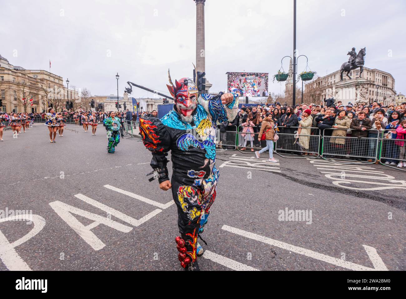 London, UK. 01st Jan, 2024. Crowds line up the streets of Central London today to enjoy The 37th ...