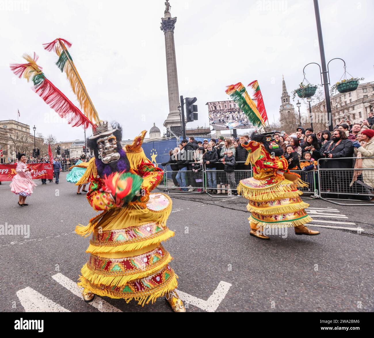London, UK. 01st Jan, 2024. Crowds line up the streets of Central London today to enjoy The 37th ...
