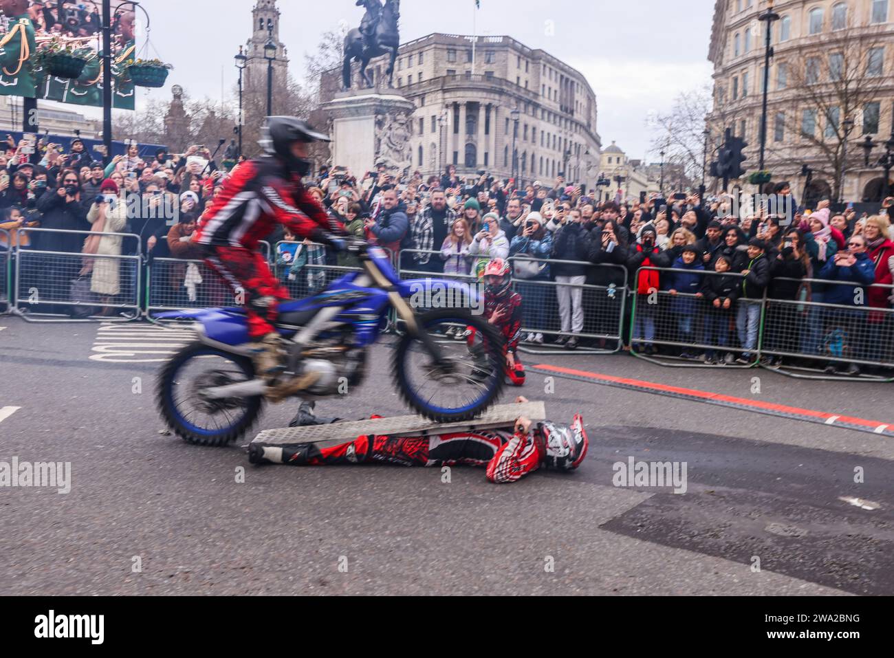 London, UK. 01st Jan, 2024. Crowds line up the streets of Central London today to enjoy The 37th ...