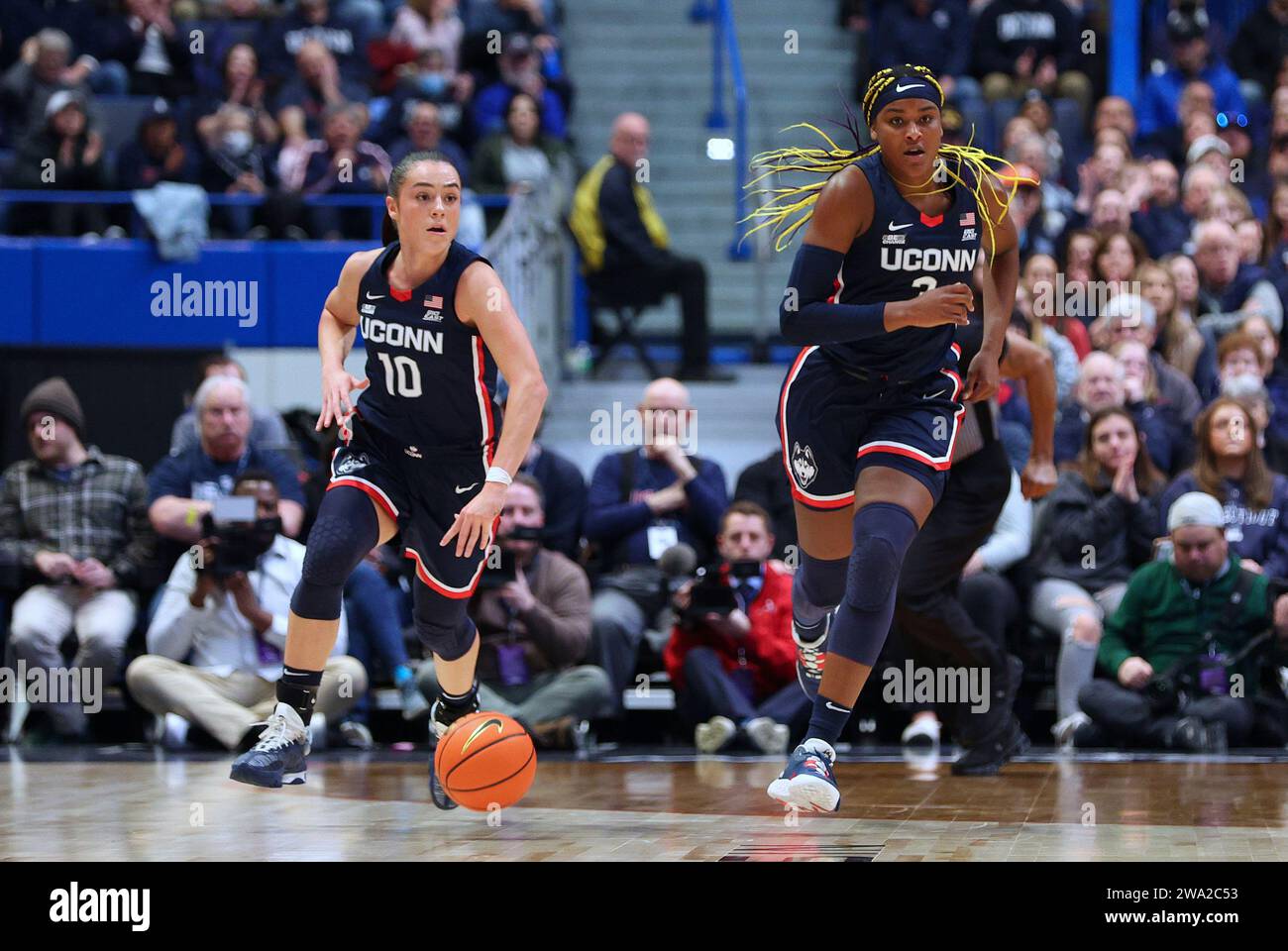 HARTFORD, CT - DECEMBER 31: UConn Huskies guard Nika Muhl (10) dribbles ...