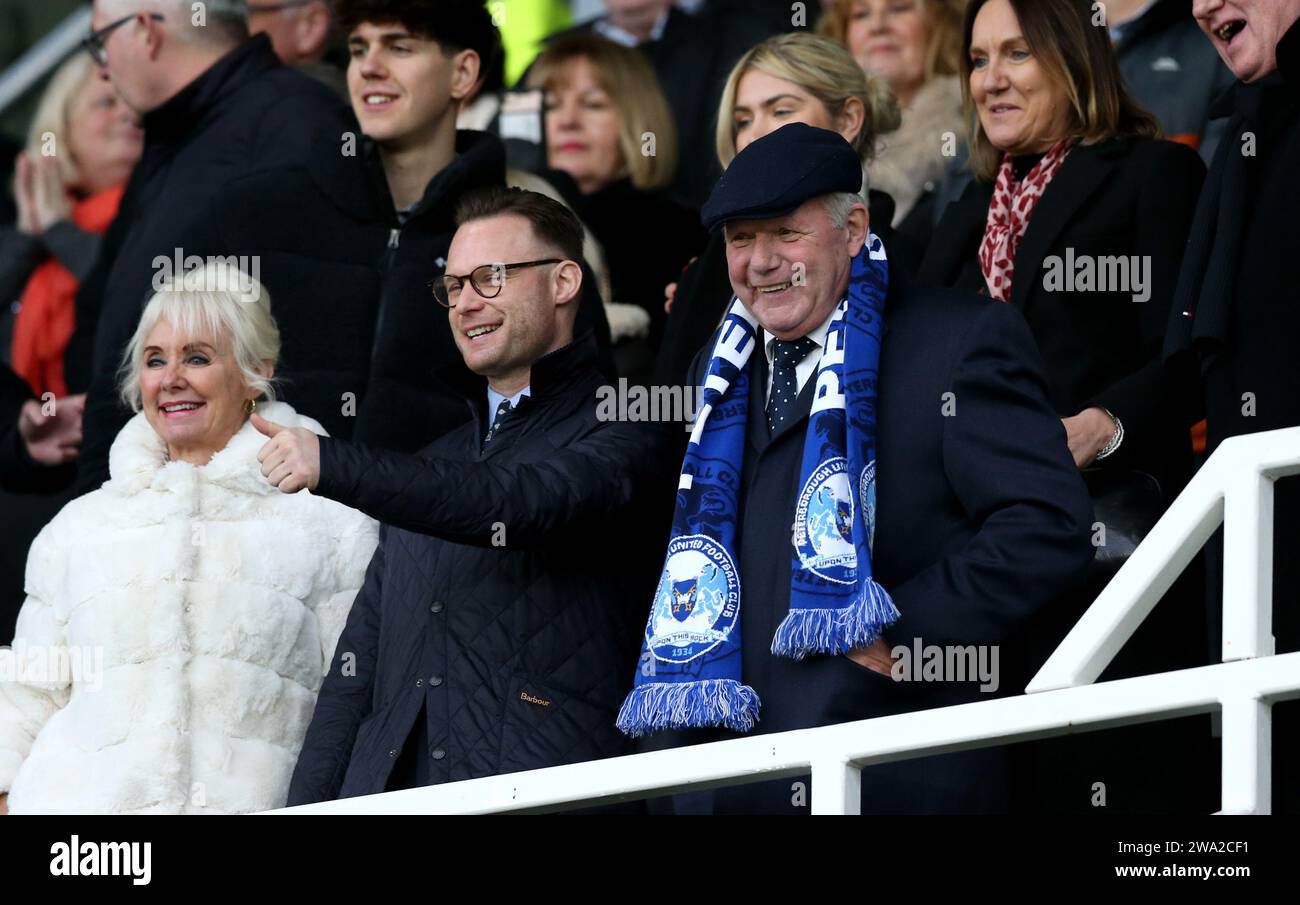 Former Peterborough United manager Barry Fry (right) watches the match ...