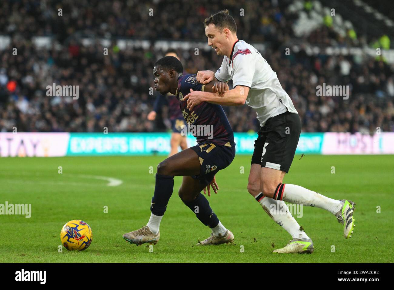Derby on Monday 1st January 2024. Ephron Mason-Clark of Peterborough ...