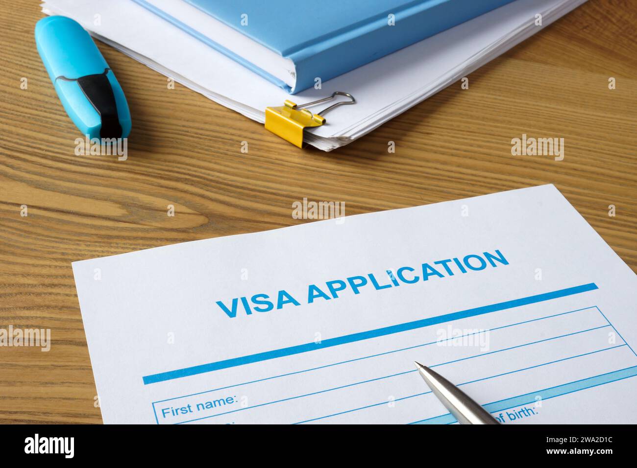 Empty visa application form and pen Stock Photo - Alamy