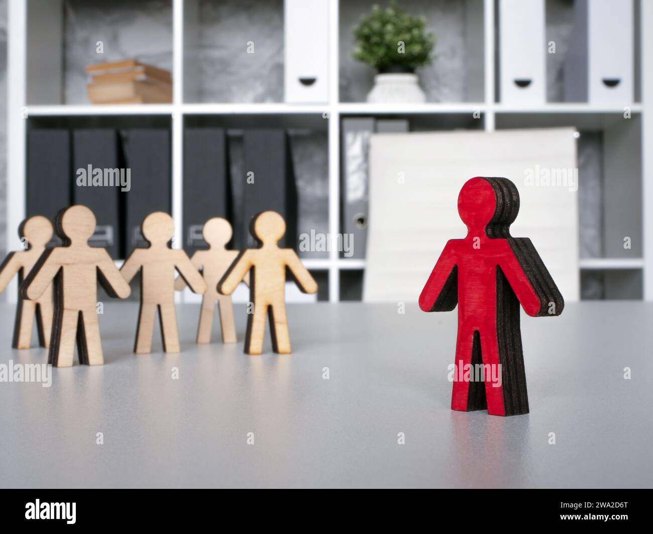 Figures on the office table and a leader. Personnel management Stock ...