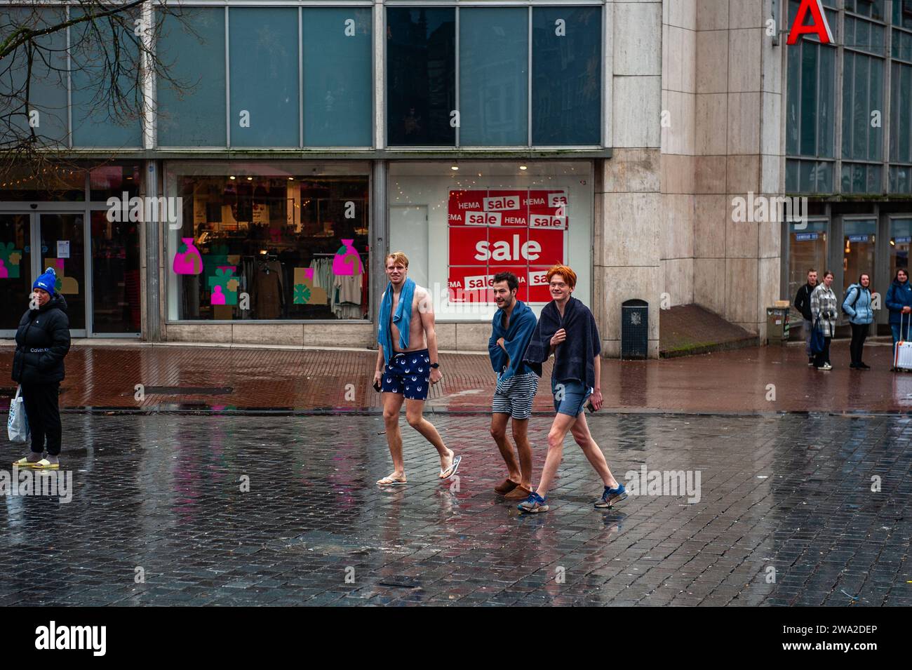 Nijmegen, Netherlands. 01st Jan, 2024. A group of men arrive while ...