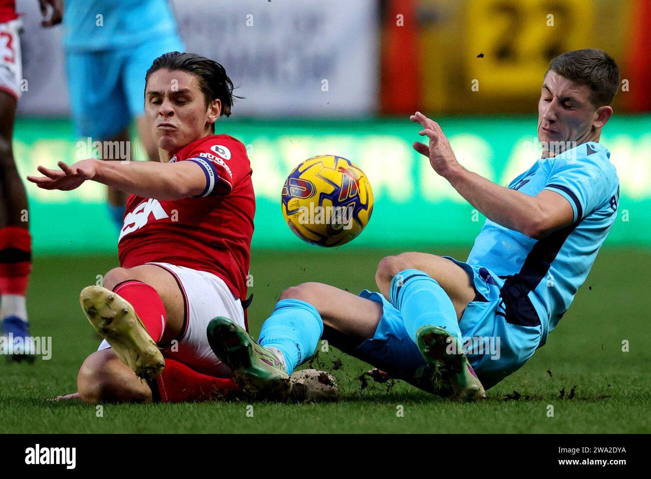 Charlton Athletic's George Dobson (left) with Oxford United's Cameron ...