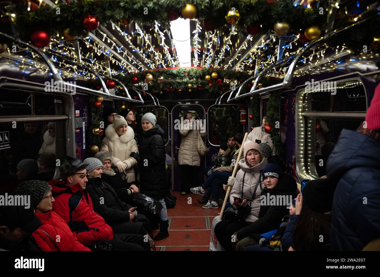 Moscow, Russia. 1st Jan, 2024. Passengers take a metro train with New ...