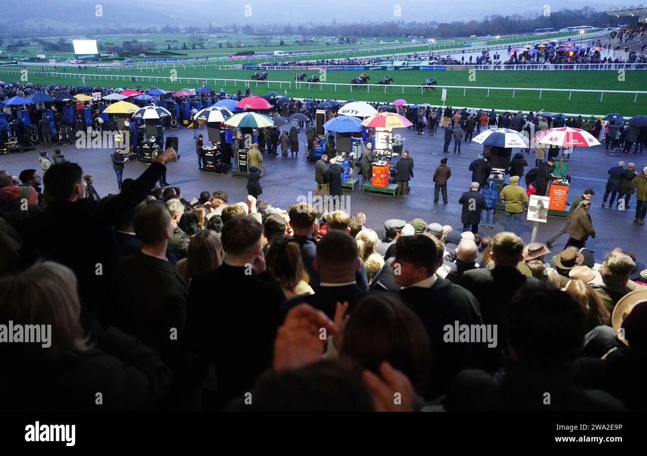 Race goers shelter while watching The Family Fun "Junior" National Hunt ...