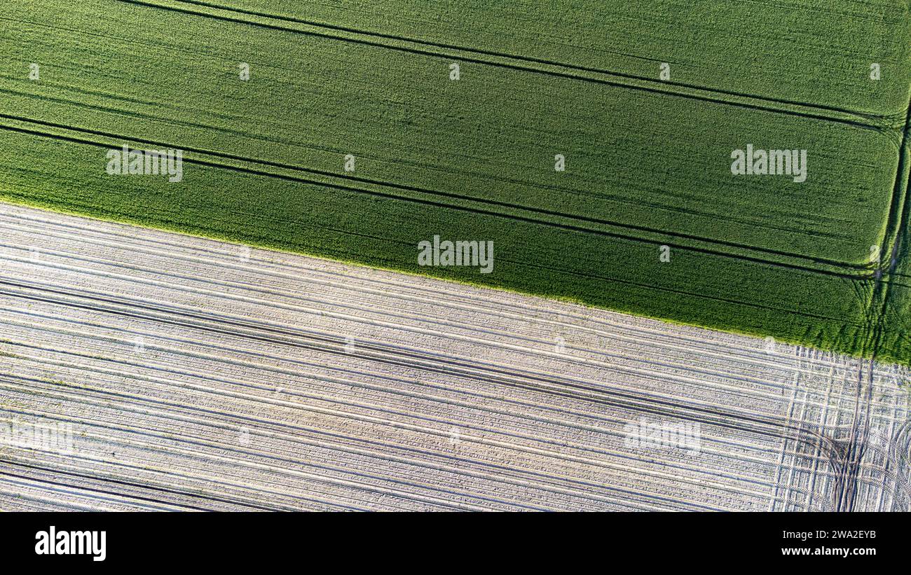 Aerial view of fields with tractor tracks Stock Photo - Alamy