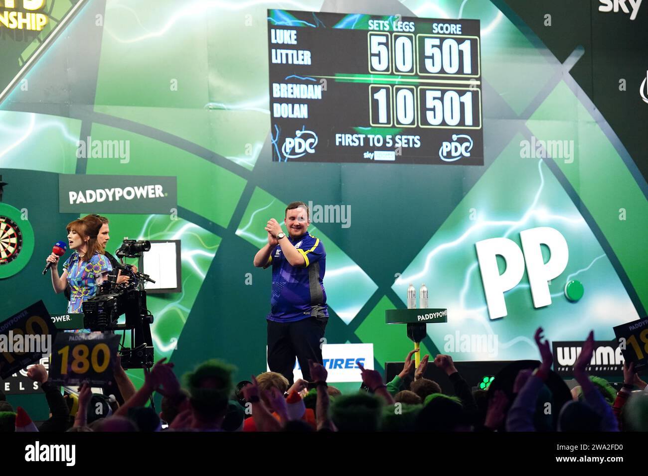 Luke Littler celebrates victory over Brendan Dolan (not pictured) on ...