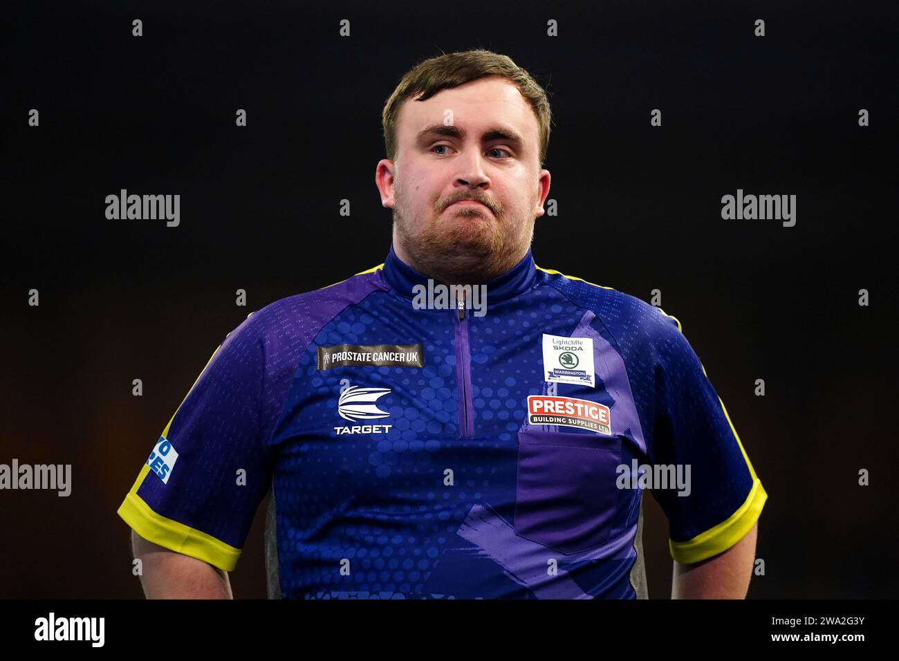 Luke Littler in action against Brendan Dolan (not pictured) on day ...