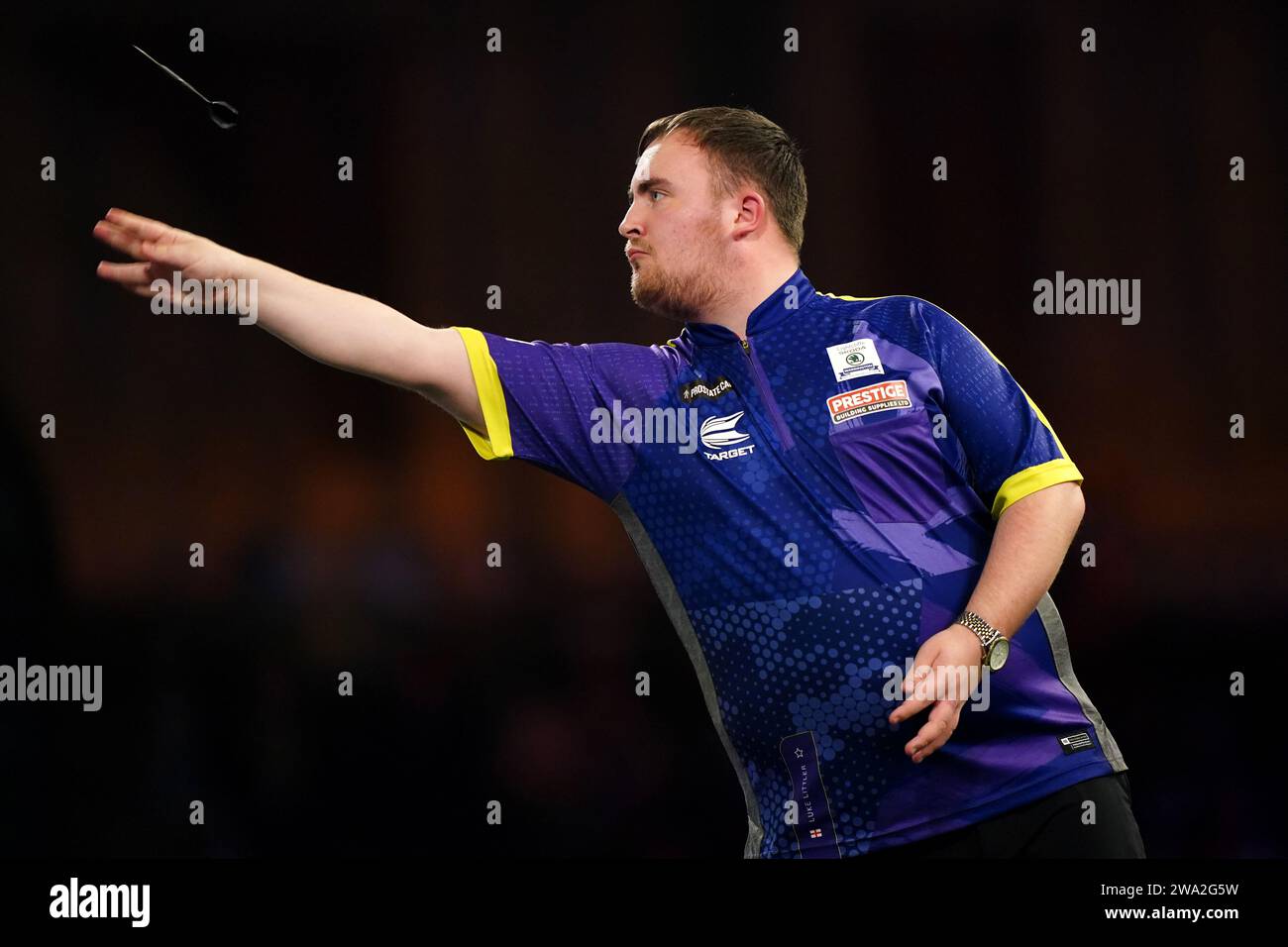 Luke Littler in action against Brendan Dolan (not pictured) on day ...