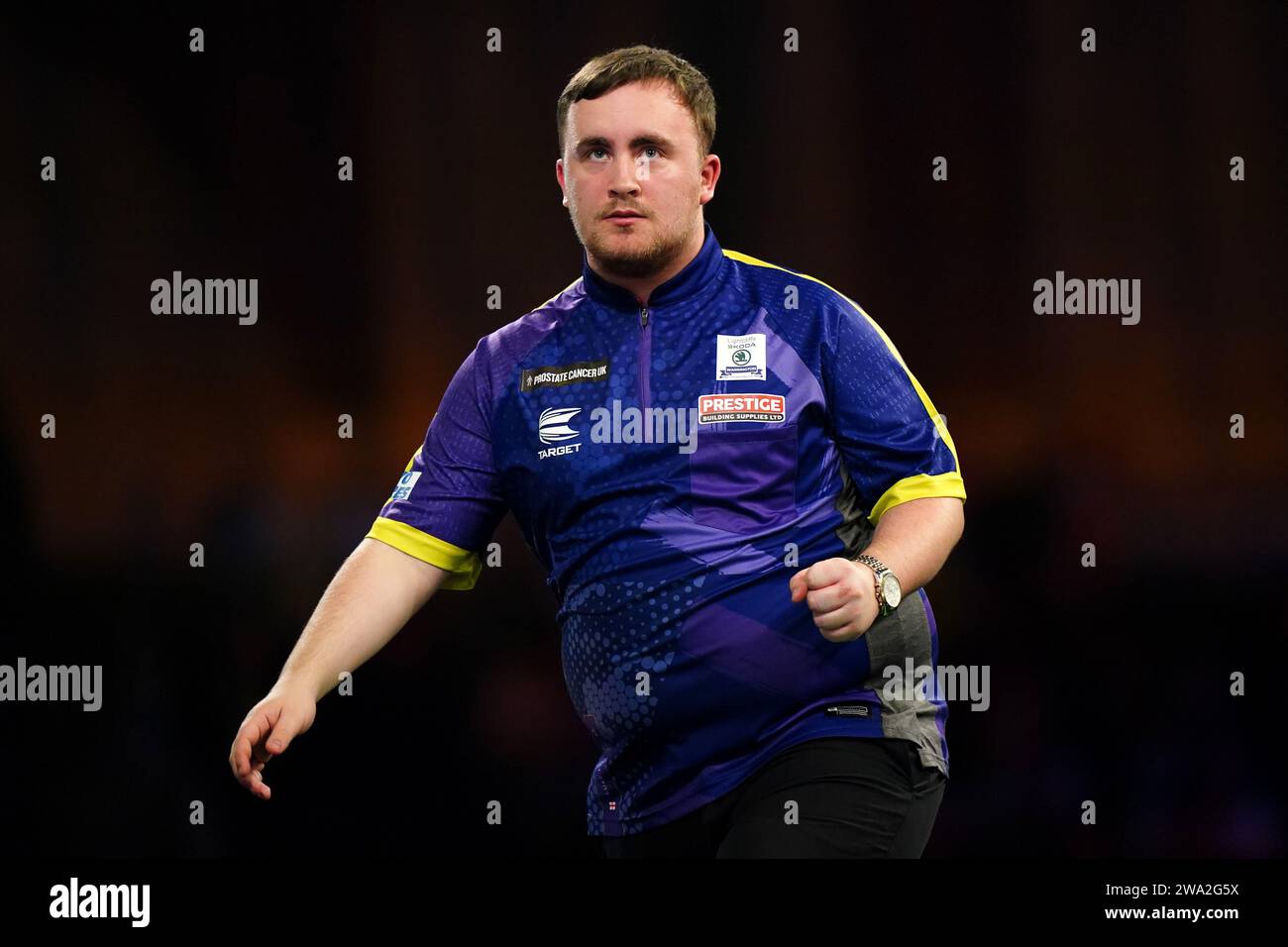 Luke Littler in action against Brendan Dolan (not pictured) on day ...