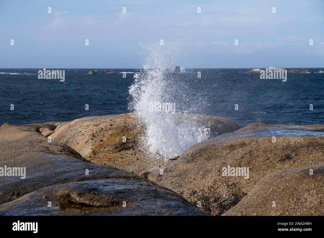 Blowhole in the granite rocks at Bicheno beach, Tasmania, Australia ...
