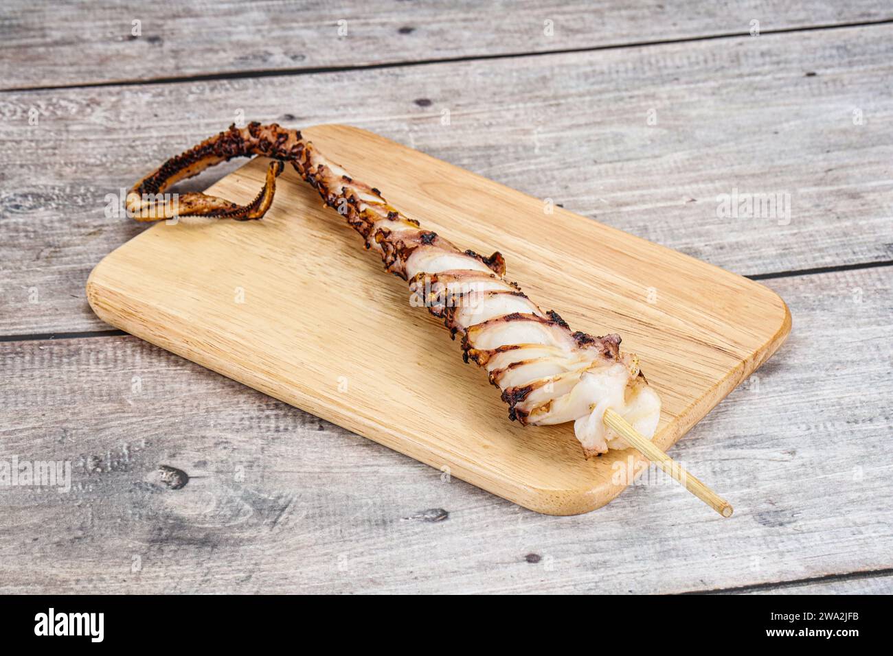 Delicous tasty Grilled octopus tentacle snack Stock Photo - Alamy