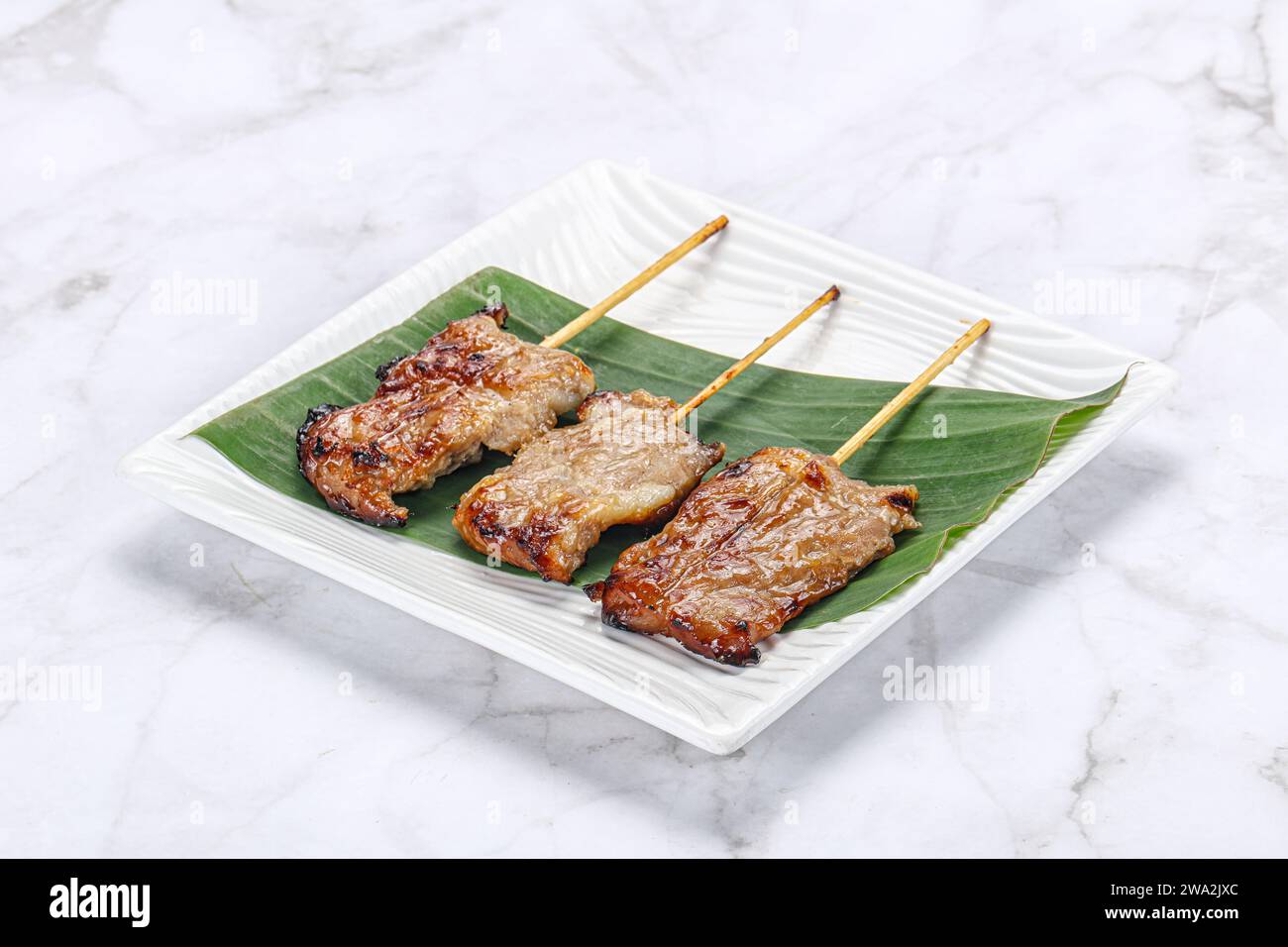 Thai traditional cuisine - grilled pork skewer Stock Photo - Alamy