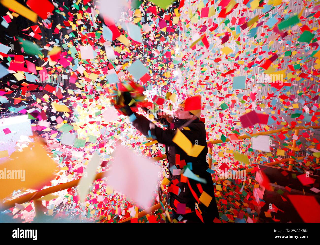 New York, United States. 01st Jan, 2024. Revelers throw confetti when ...