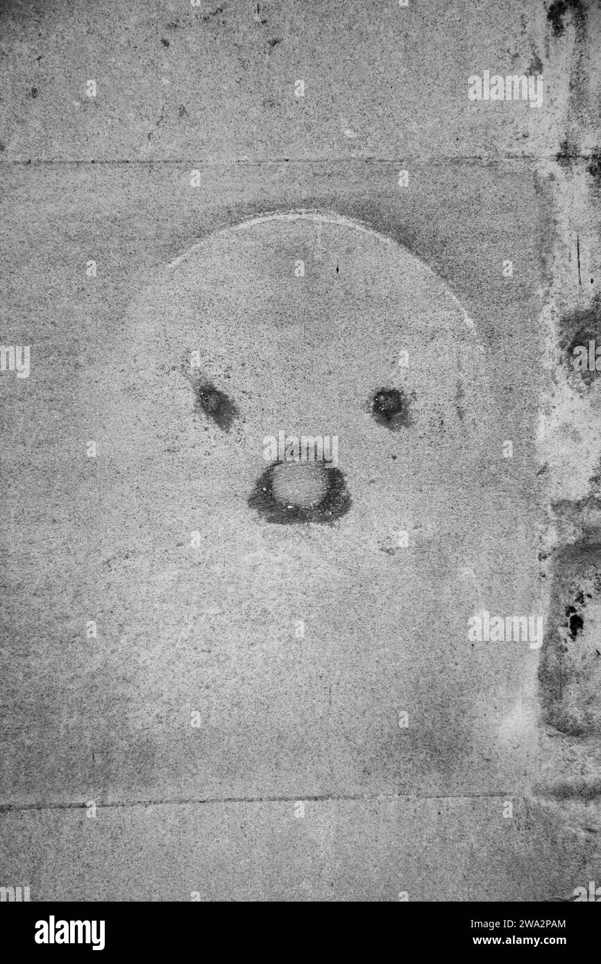 "Ghost" snowman as marks left by fittings removed from a stone wall ...