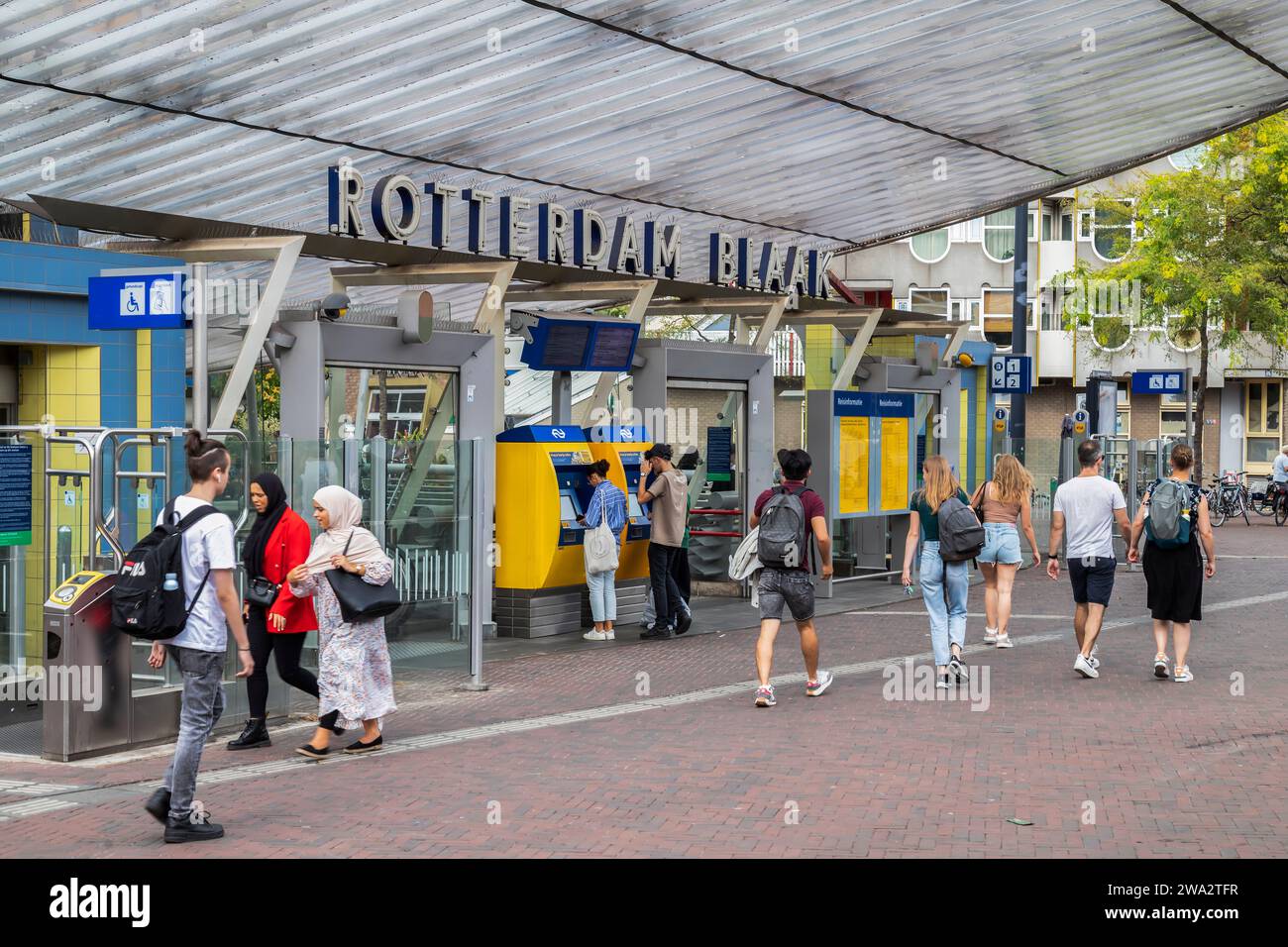 People buy a ticket at Blaak metro station in Rotterdam Stock Photo - Alamy
