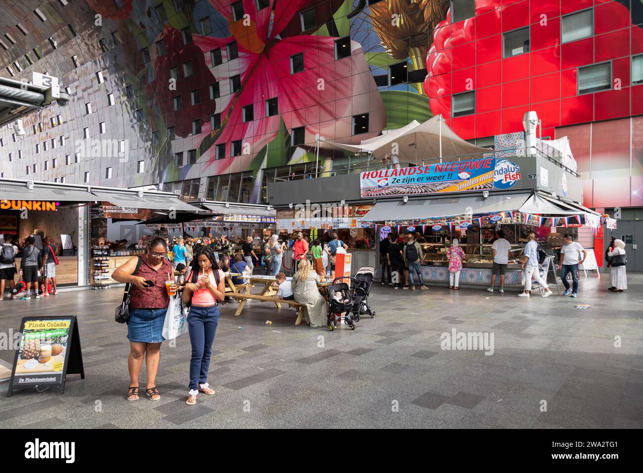 Modern market hall with many eateries and shops in the center of ...