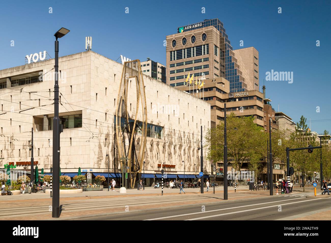 Busy shopping street with high modern buildings in the center of the ...