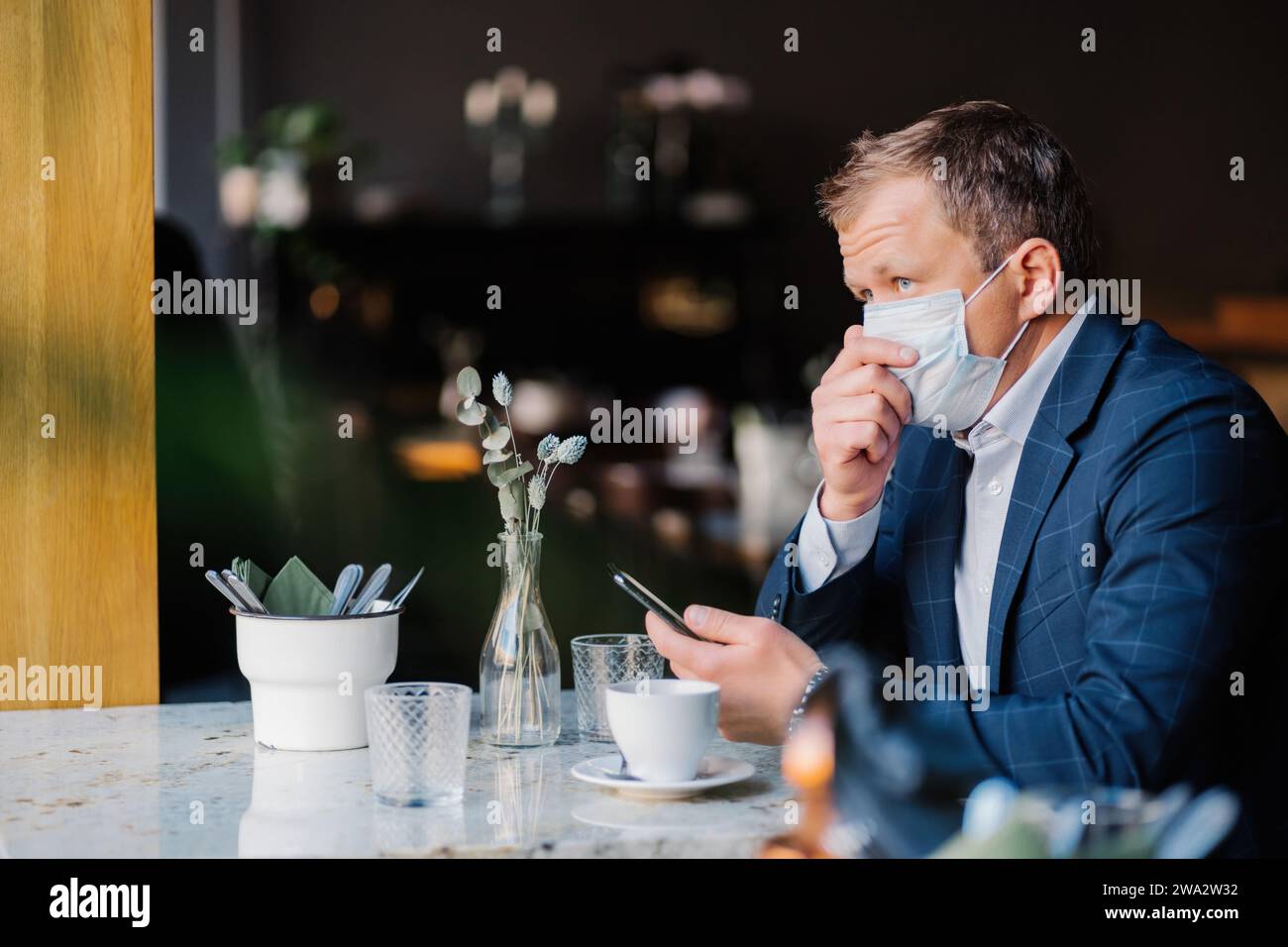 Young man holding sip hi-res stock photography and images - Alamy