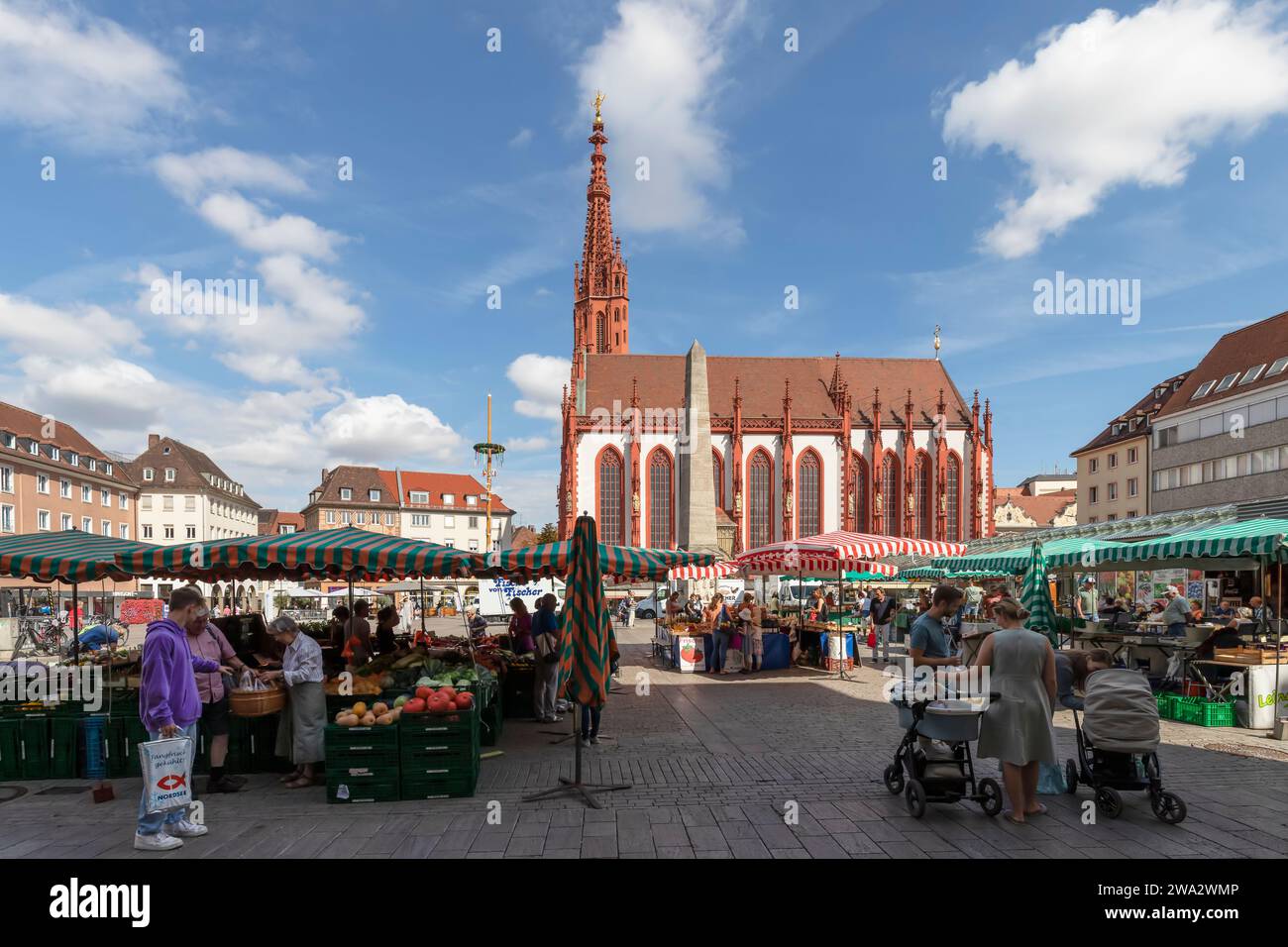 Cozy market square in the historic city of Würzburg with a view of the ...