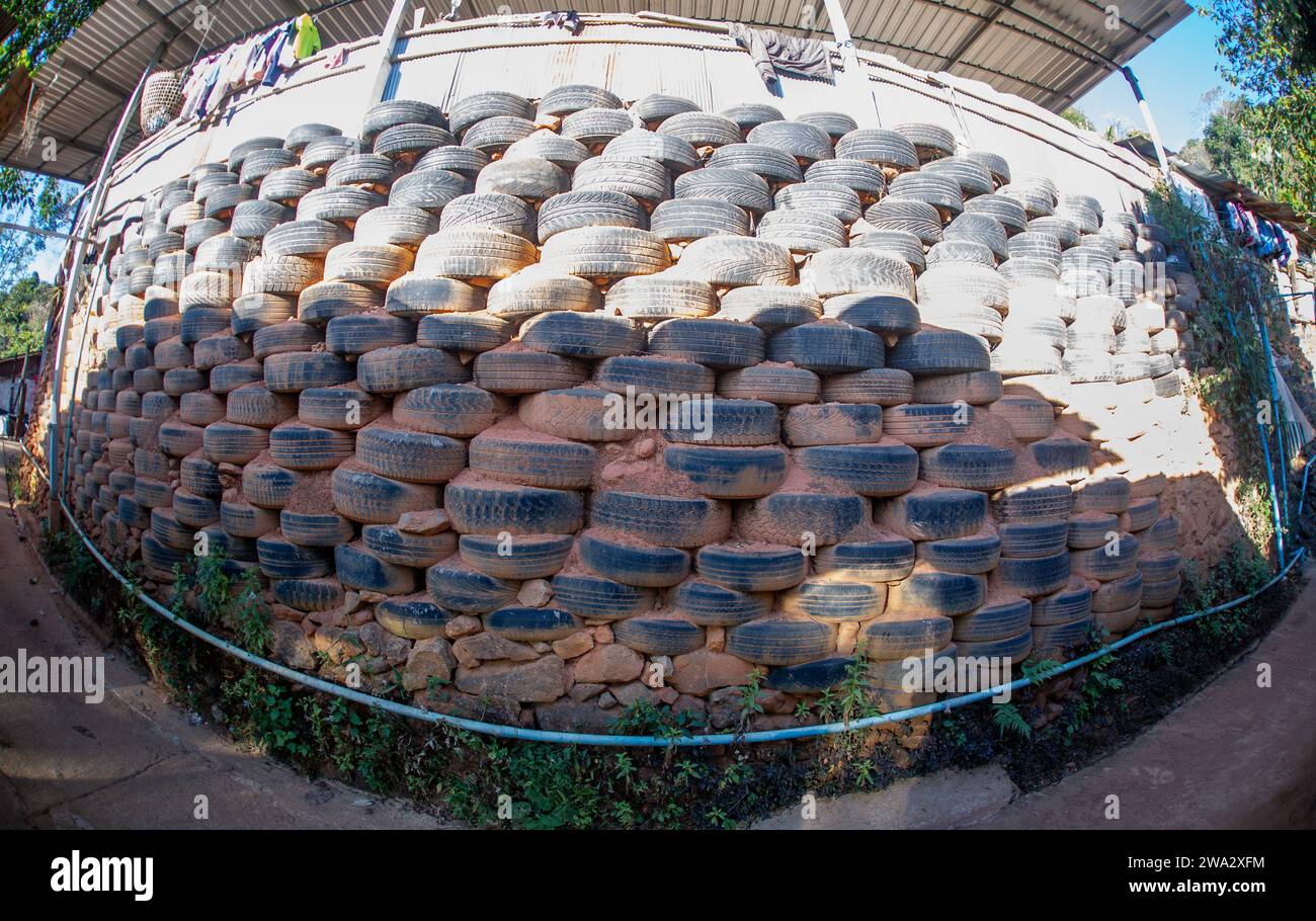 Curb wall built from used tyres for protection Stock Photo - Alamy