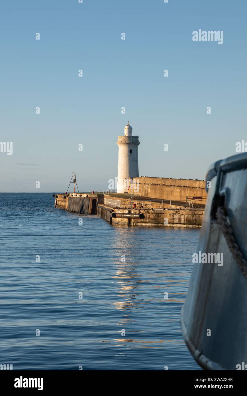 Buckie Harbour, Moray, UK. 1st Jan, 2024. This shows the entrance pier ...