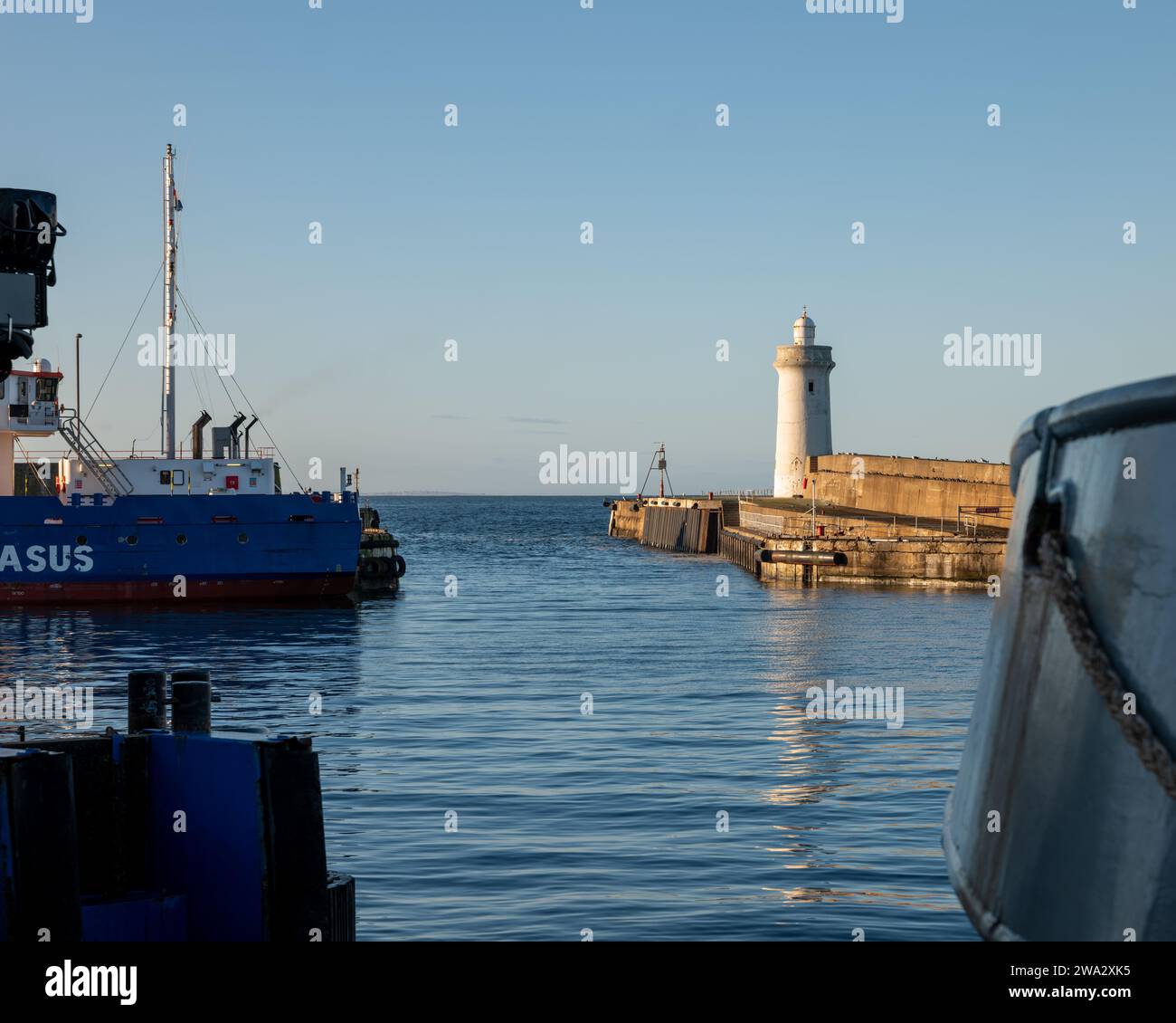 Buckie Harbour, Moray, UK. 1st Jan, 2024. This shows the entrance pier ...