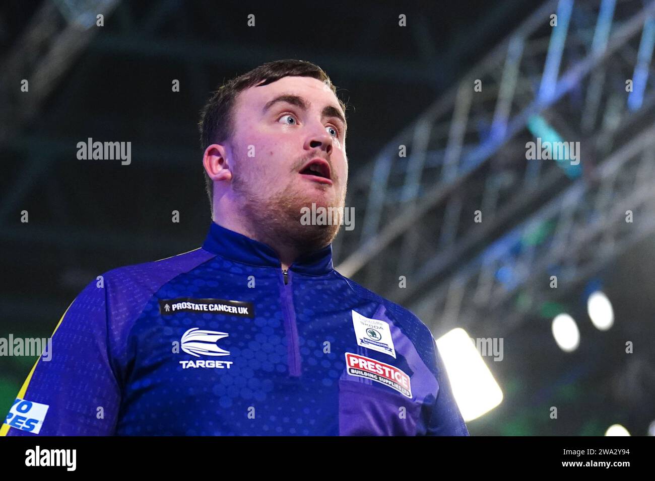 Luke Littler in action against Brendan Dolan (not pictured) on day ...