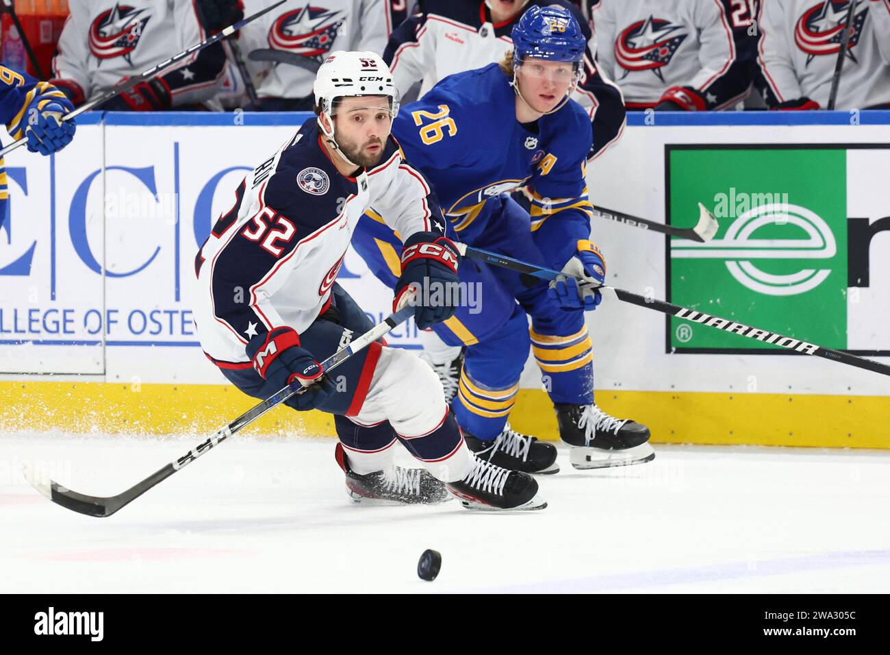 Columbus Blue Jackets right wing Emil Bemstrom (52) and Buffalo Sabres ...