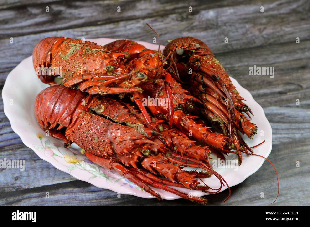 Lobster meal cooked and served, Lobsters are a family Nephropidae ...
