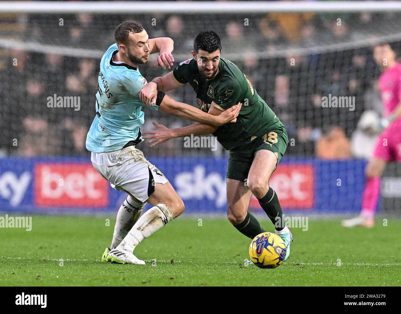 Finn Azaz of Plymouth Argyle battles for the ball during the Sky Bet ...
